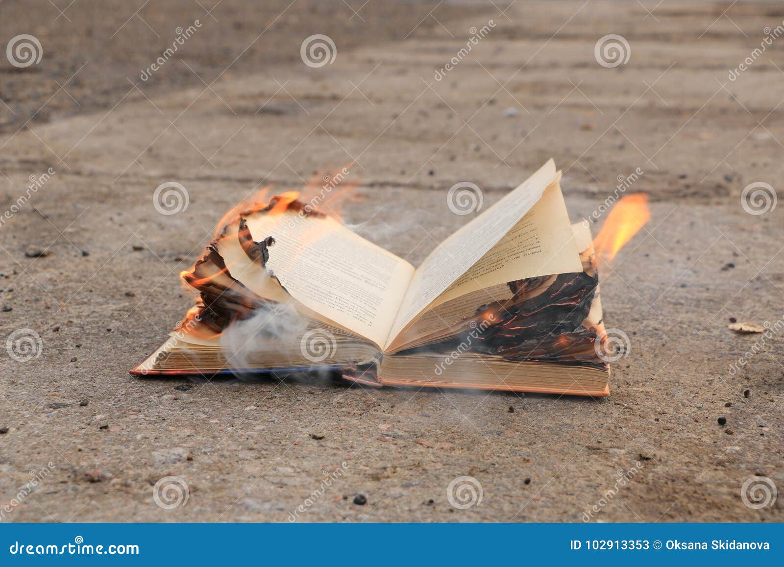 Book with Burning Pages on a Concrete Surface Stock Image - Image of ...