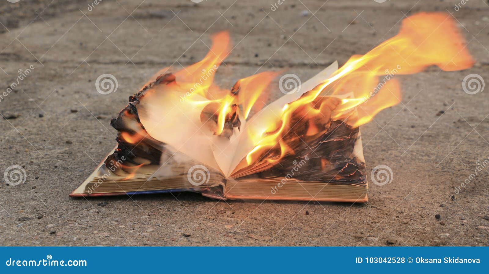 Book with Burning Pages on a Concrete Surface Stock Photo - Image of ...
