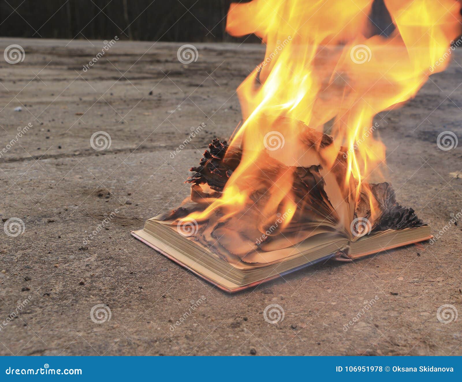 Book with Burning Pages on a Concrete Surface Stock Photo - Image of ...