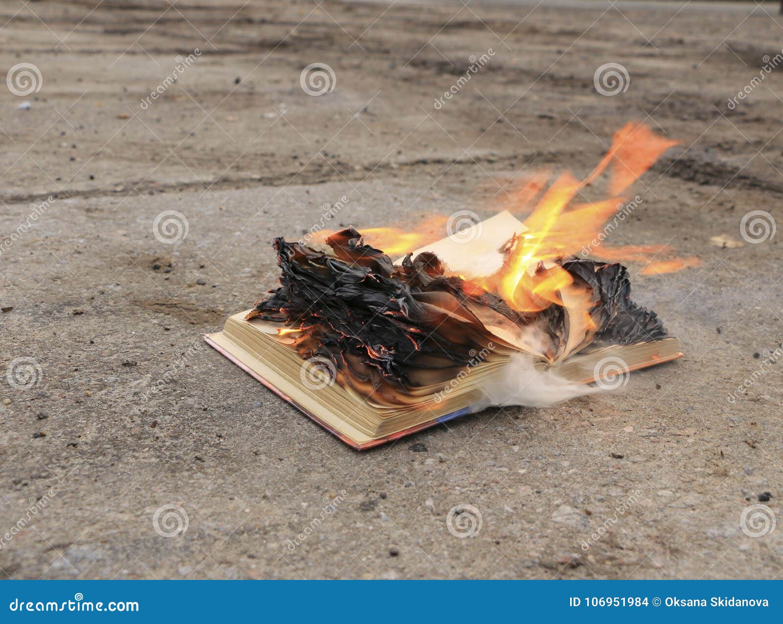 Book with Burning Pages on a Concrete Surface Stock Photo - Image of ...
