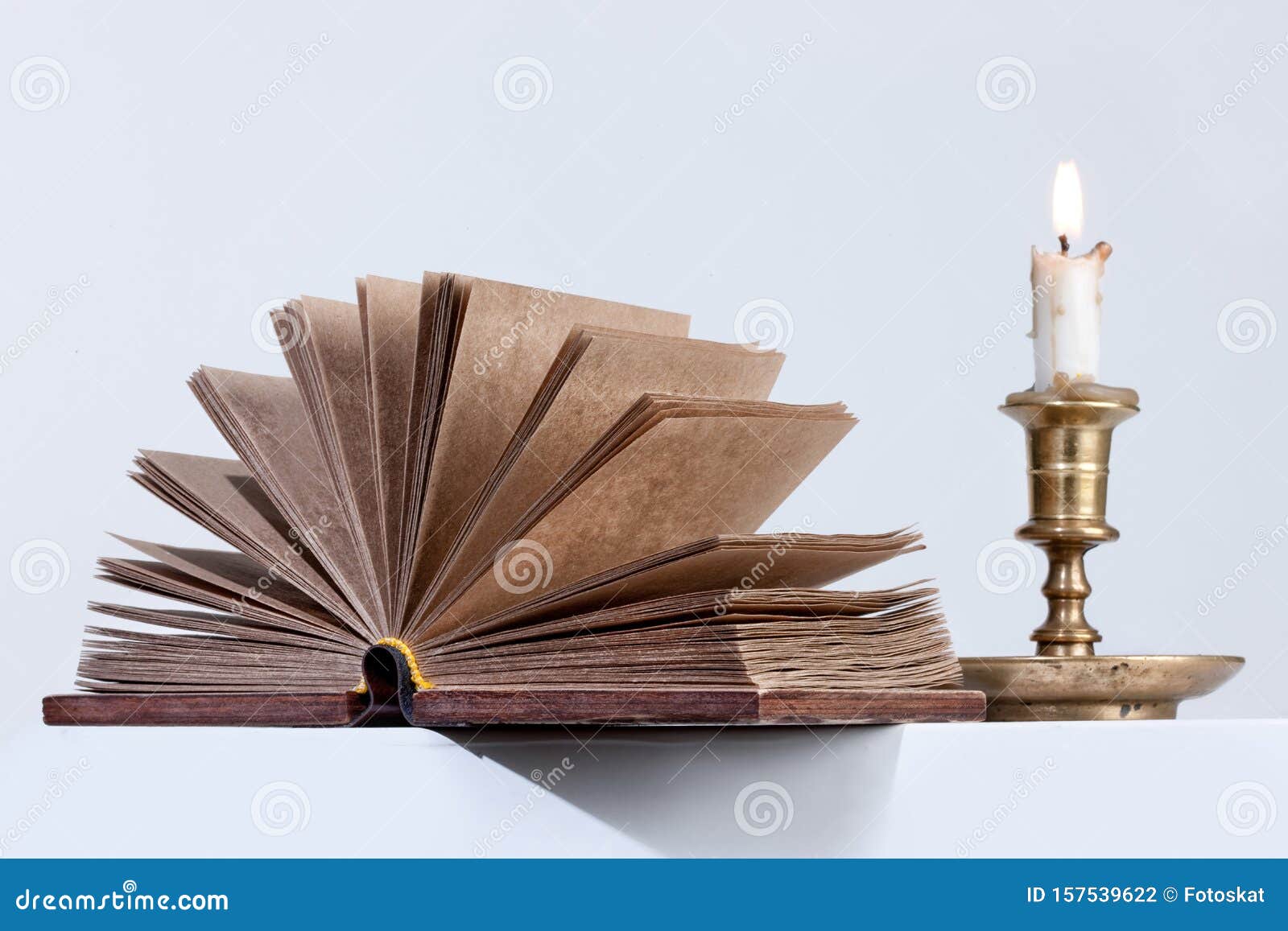 Book and Candle stock photo. Image of candle, paper - 157539622