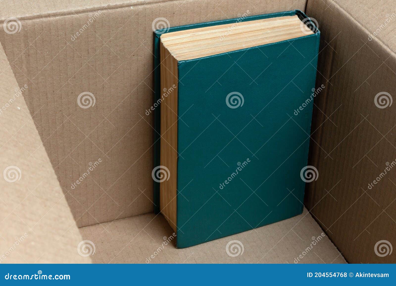 Book in a cardboard box stock photo. Image of inside - 204554768