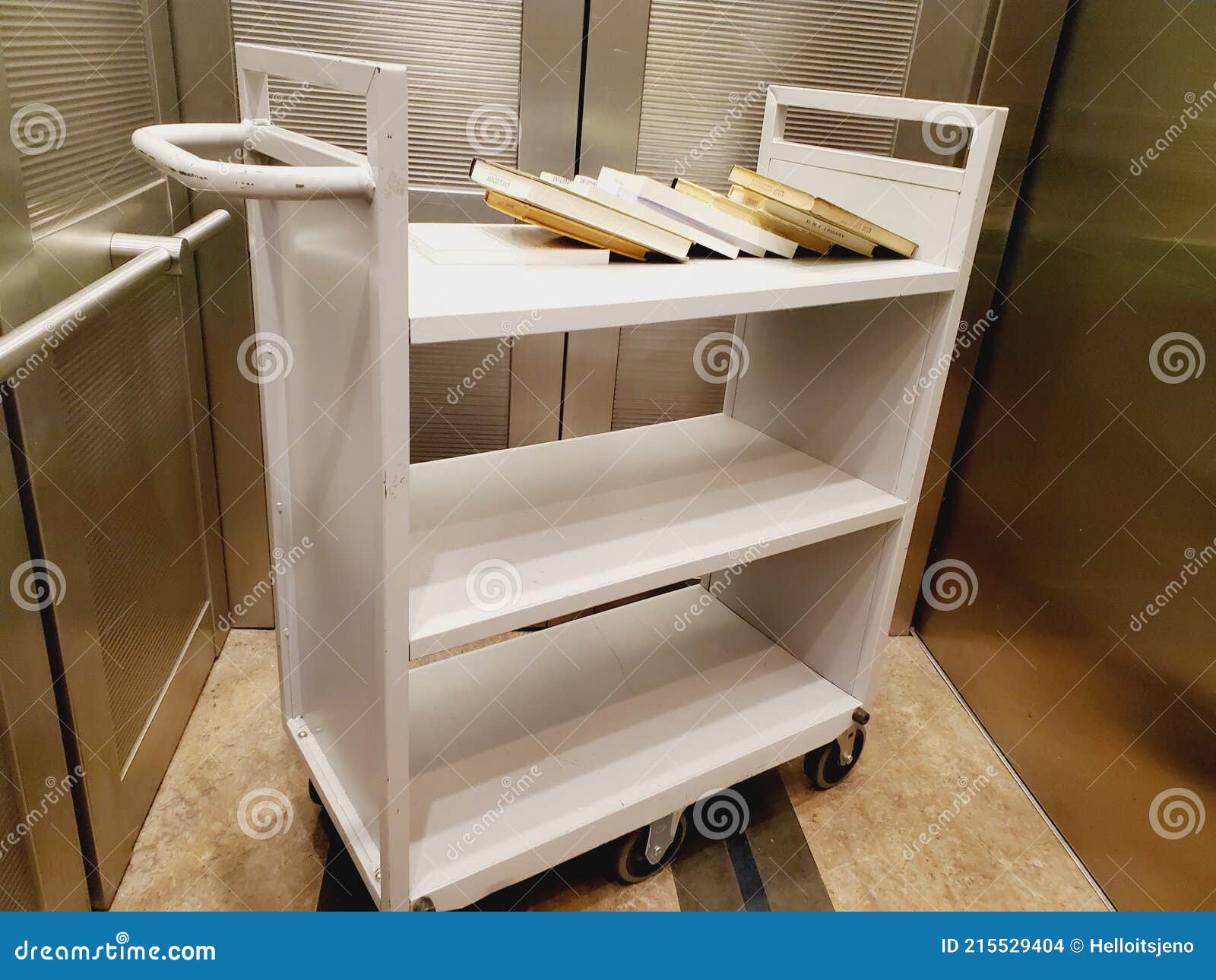 Book cart in elevator stock photo. Image of shelf, wall - 215529404