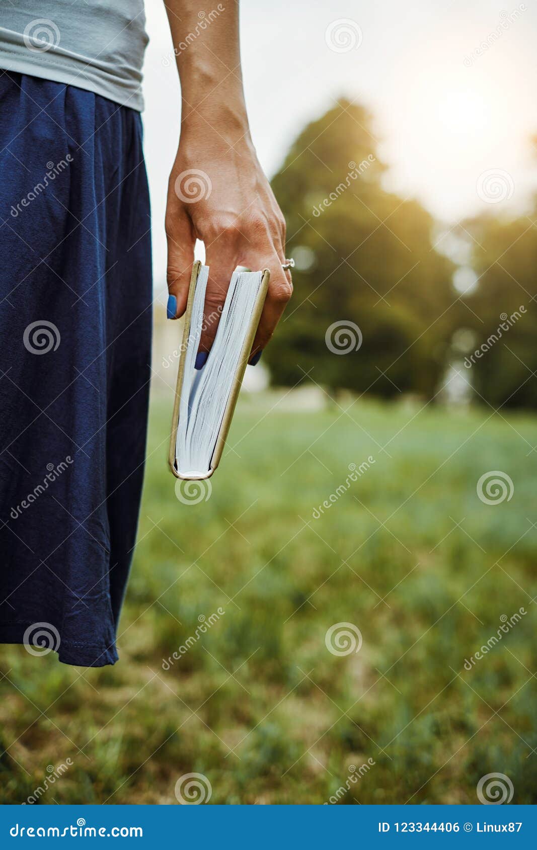 Book on hand stock photo. Image of outside, document - 123344406