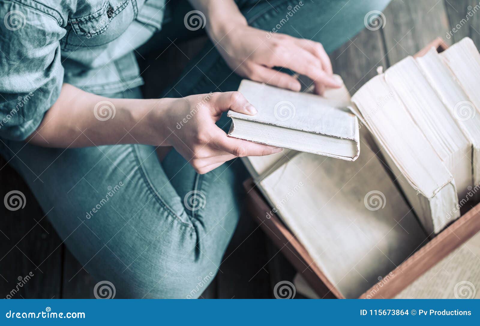 Book in hand stock photo. Image of education, idea, face - 115673864