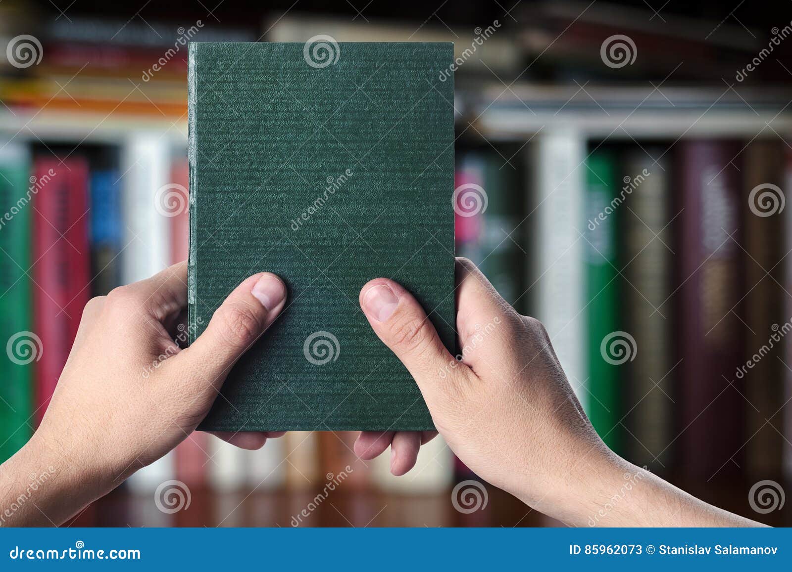 The book is in the hands stock image. Image of note, library - 85962073