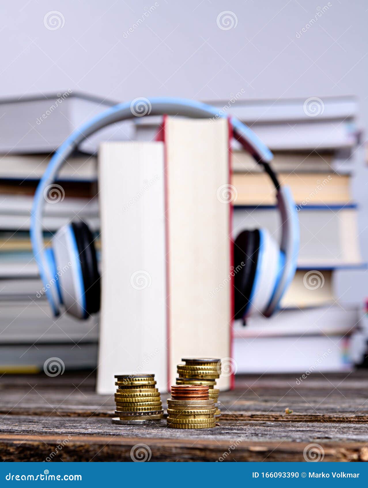Book with Headphone in Front of Piles of Different Books Stock Photo ...