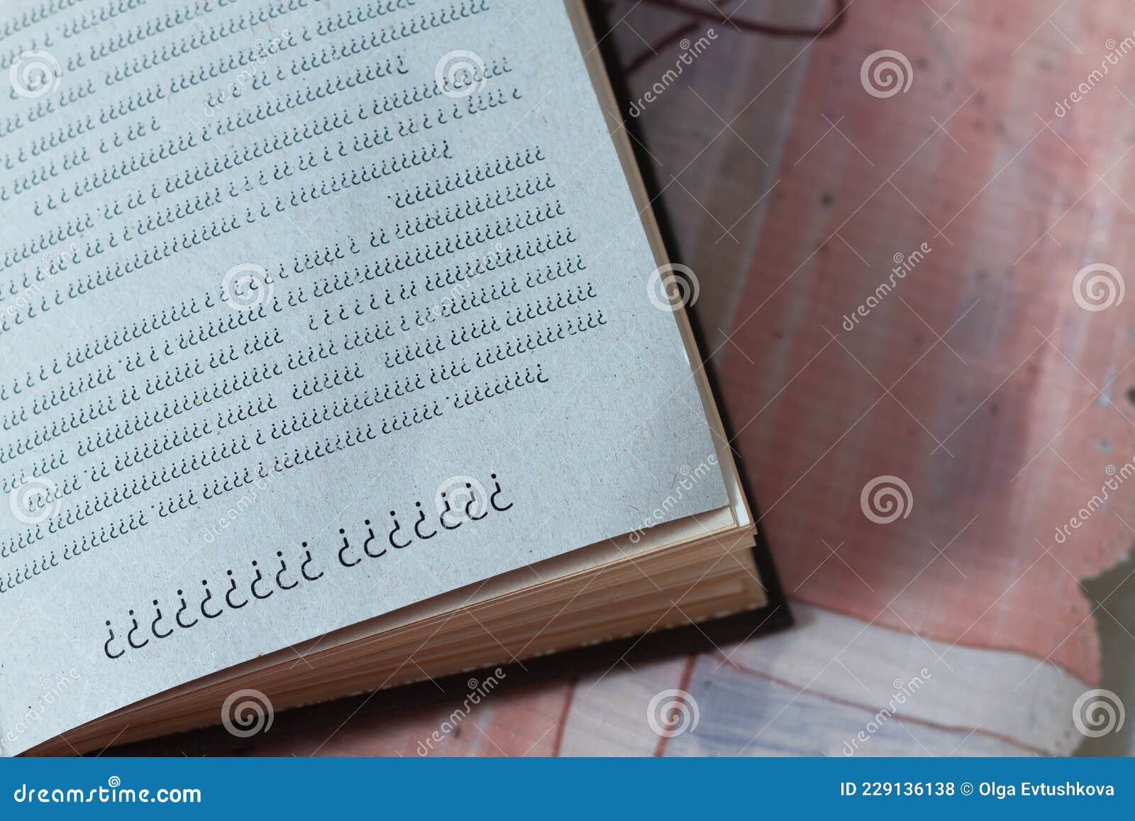 A Book With Incomprehensible Symbols In The Form Of Question Marks ...