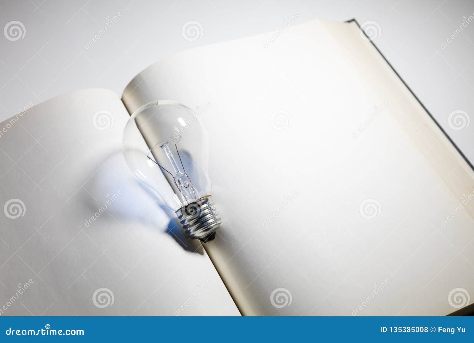 Book and light bulb stock photo. Image of outside, learn - 135385008