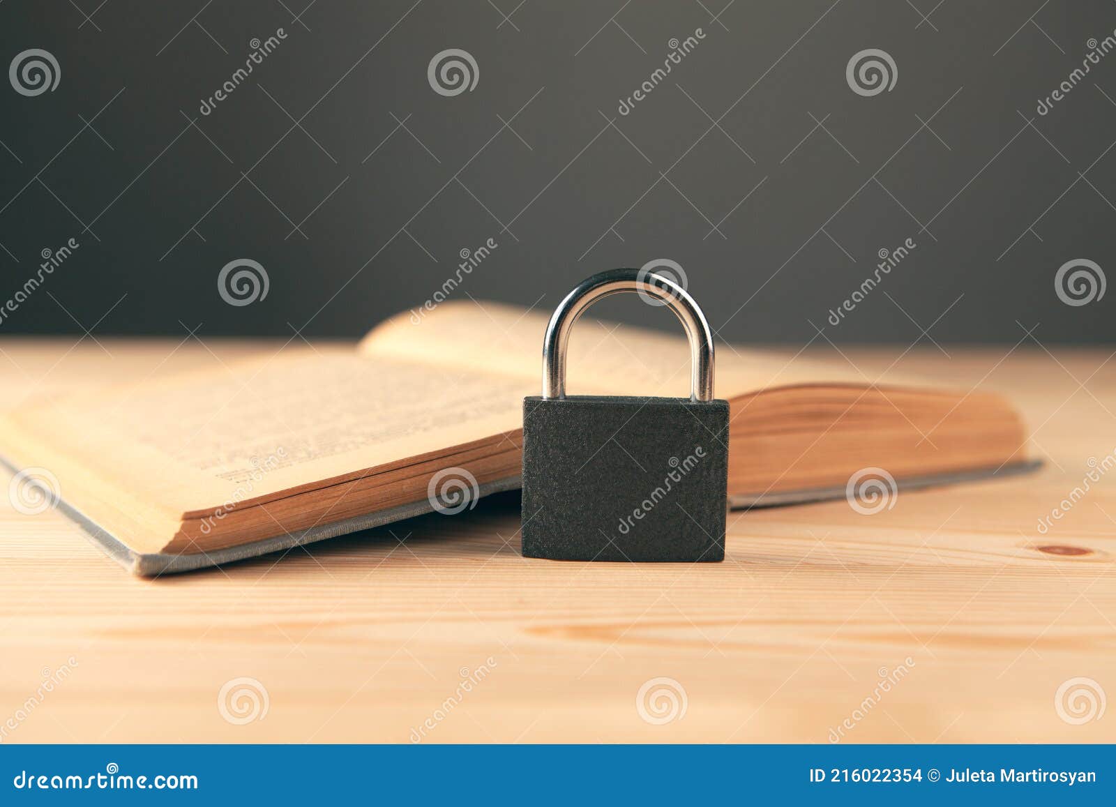 Book and Lock on a Wooden Table Stock Photo - Image of learning ...