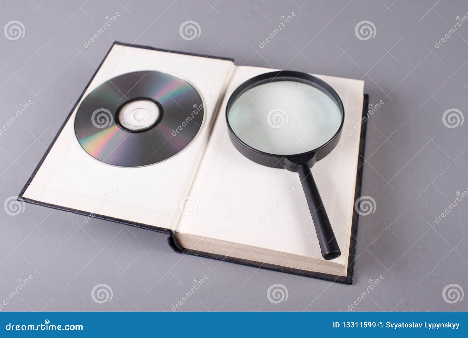 Book with Magnifying Glass and Compact Disk Stock Image - Image of ...