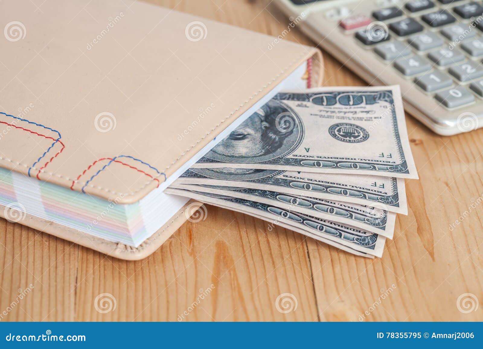 Book with Money on Wood Table Stock Image - Image of wood, table: 78355795