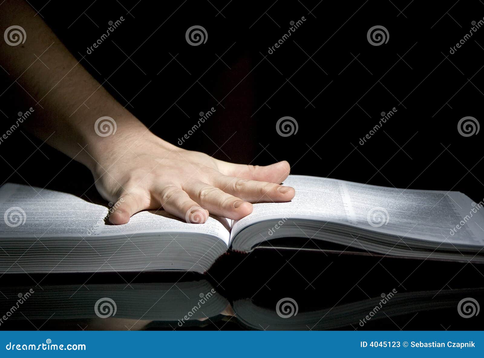Book and open hand stock image. Image of calm, background - 4045123