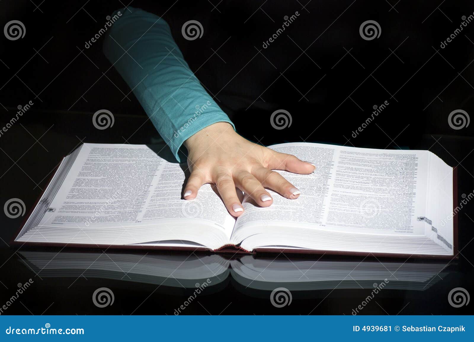 Book and open hand stock image. Image of decisive, opened - 4939681