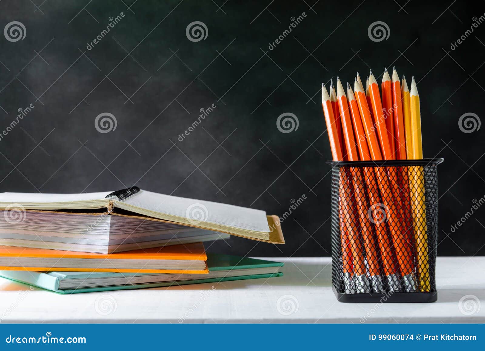 Book and Pencil on White Table Black Board Background with Study Stock ...
