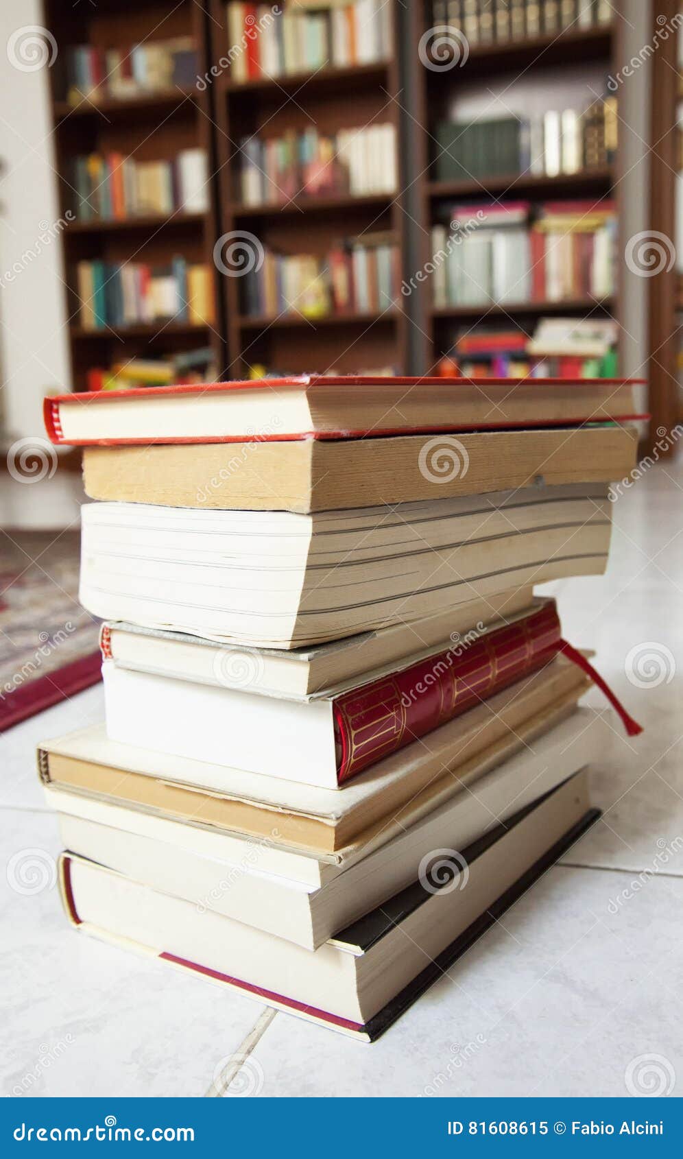 Book in a pile over floor stock image. Image of background - 81608615