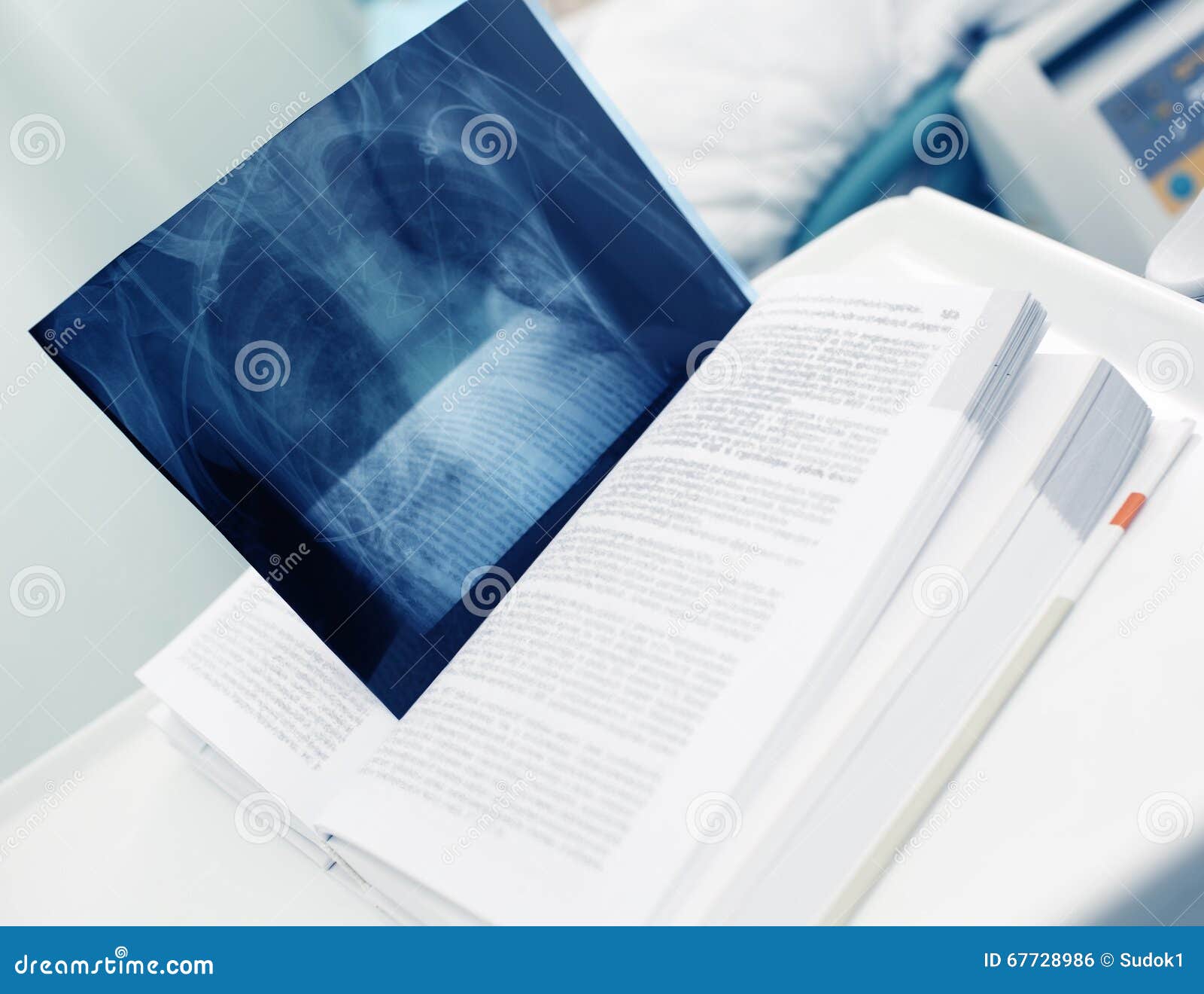 Book with an X-ray Image As a Bookmark in Hospital, Concept of T Stock ...