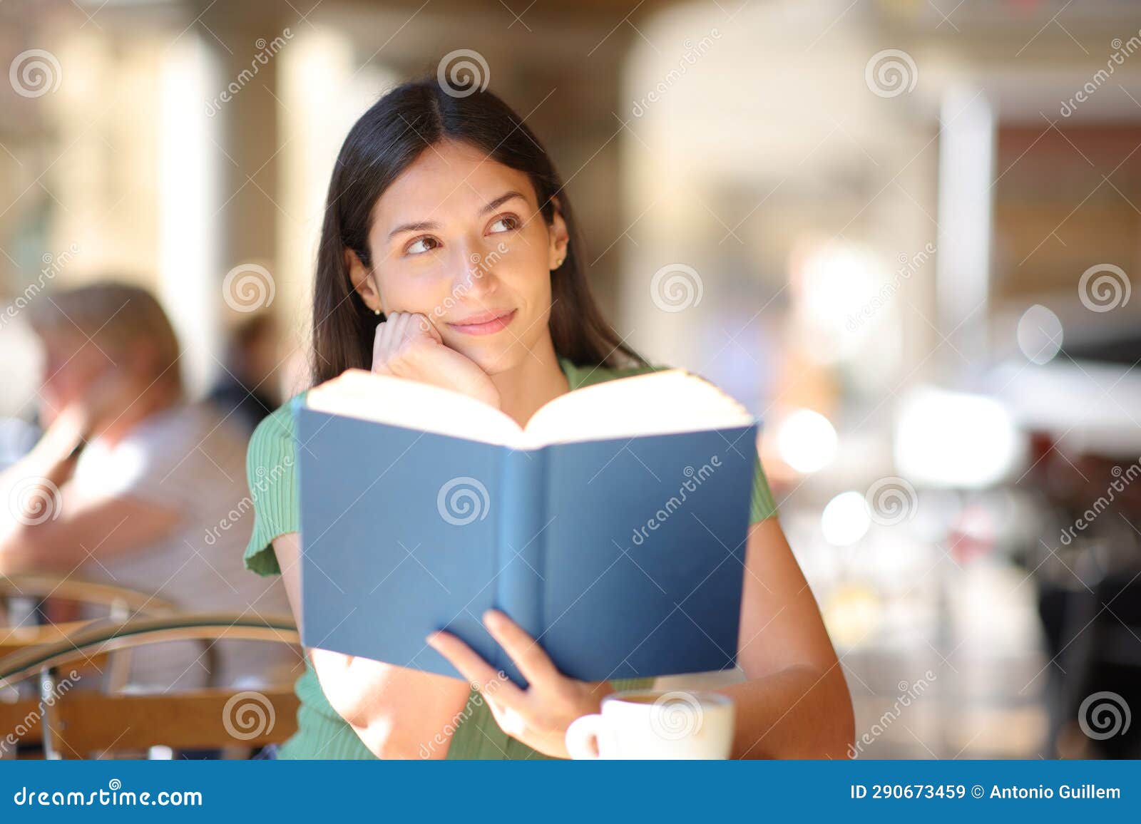 Book Reader Dreaming Looking at Side in a Bar Stock Image - Image of ...