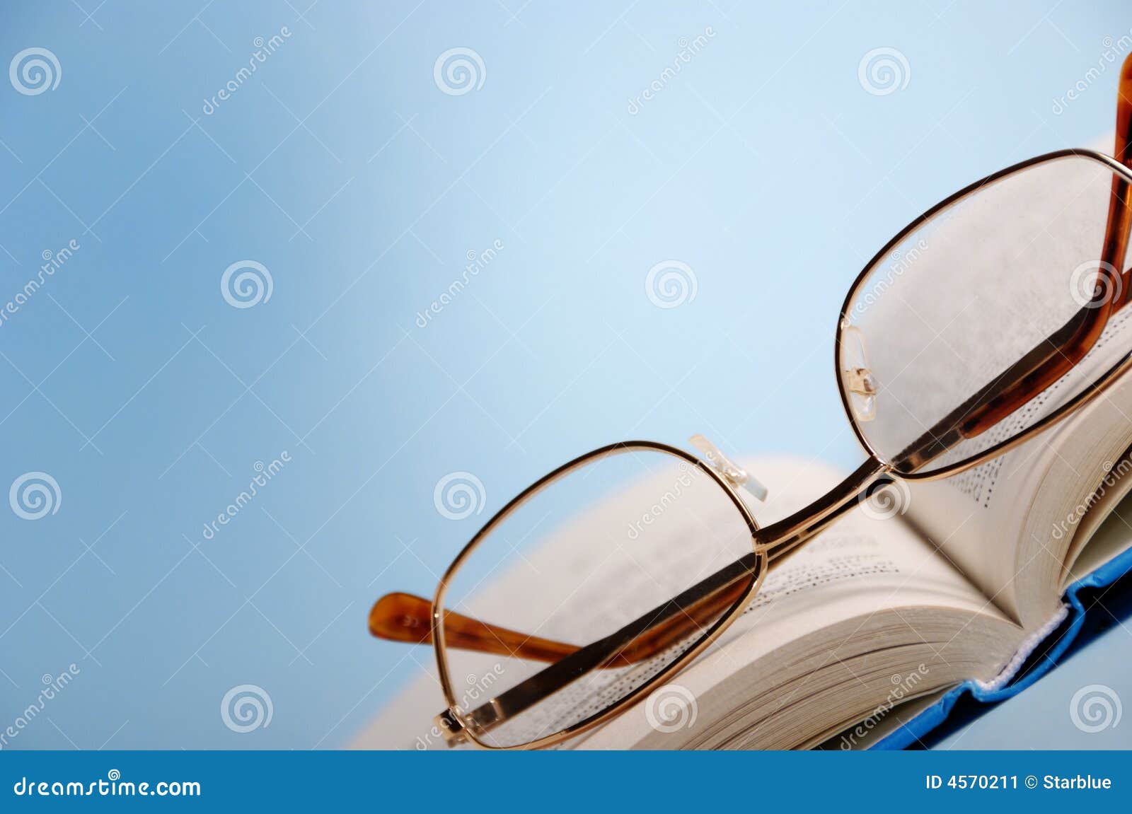 Book with reading glasses stock image. Image of study - 4570211