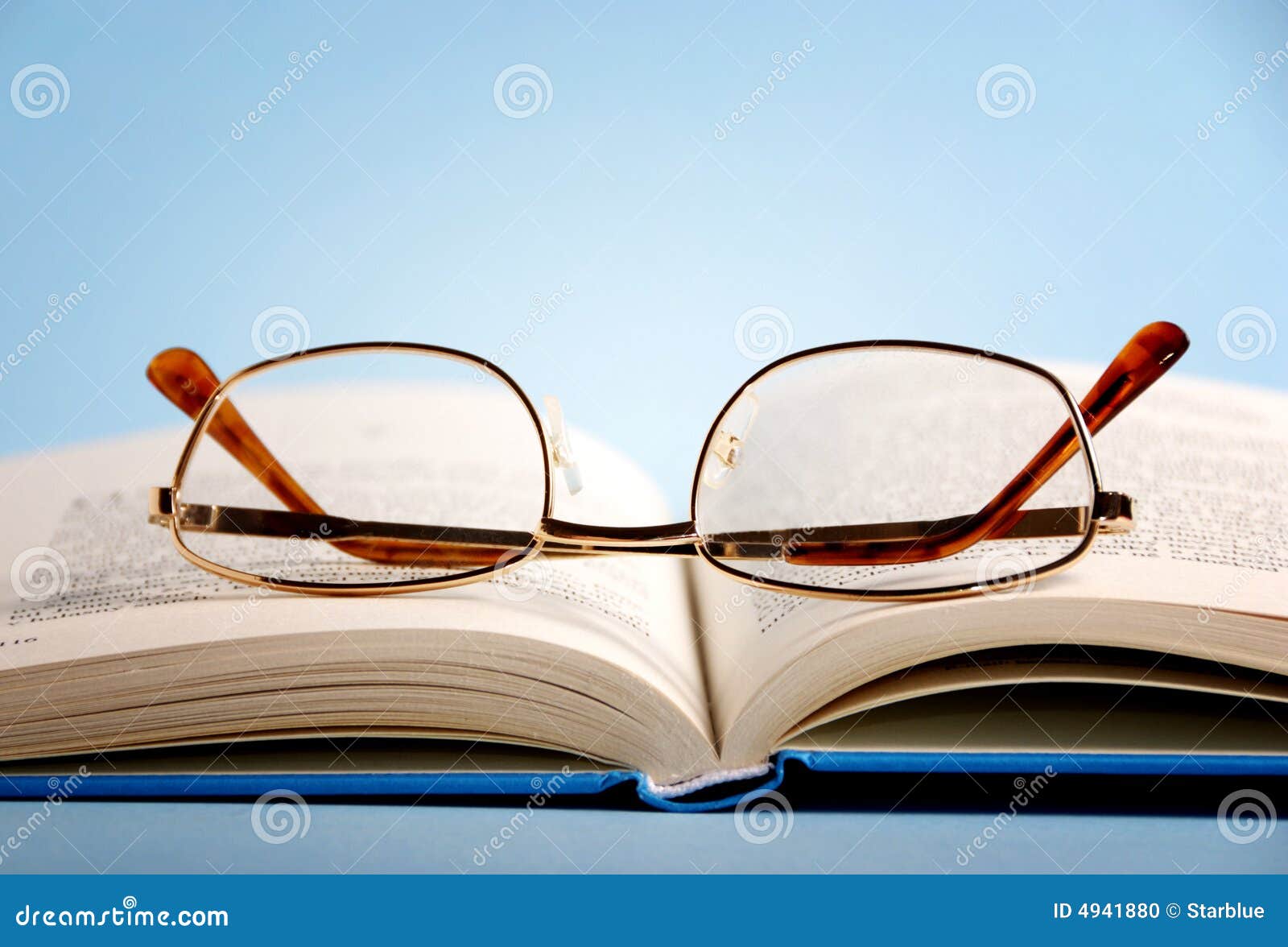 Book with reading glasses stock photo. Image of printed - 4941880