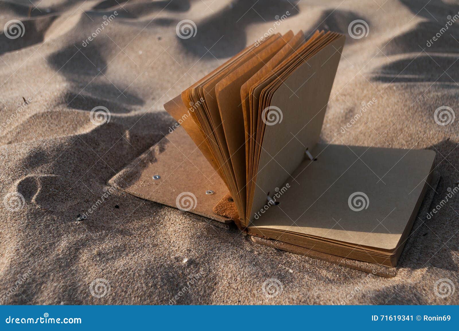 Book on sand stock image. Image of sunny, pages, summer - 71619341