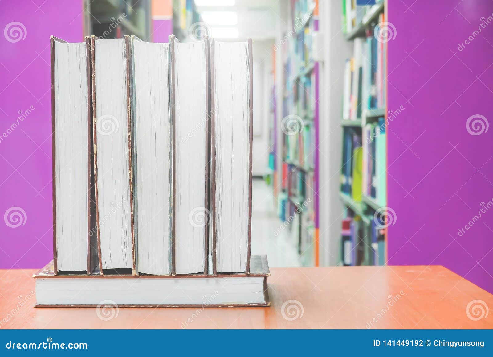 Book Stack in the Library Room and Blurred Bookshelf for Business and ...