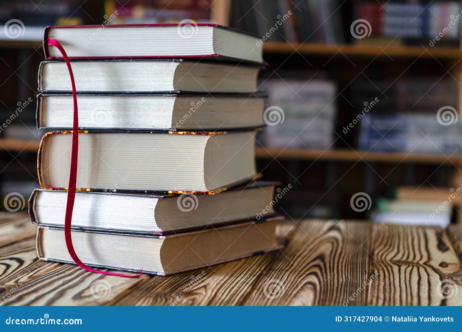 Book Stack in the Library Room and Blurred Bookshelf for Business and ...