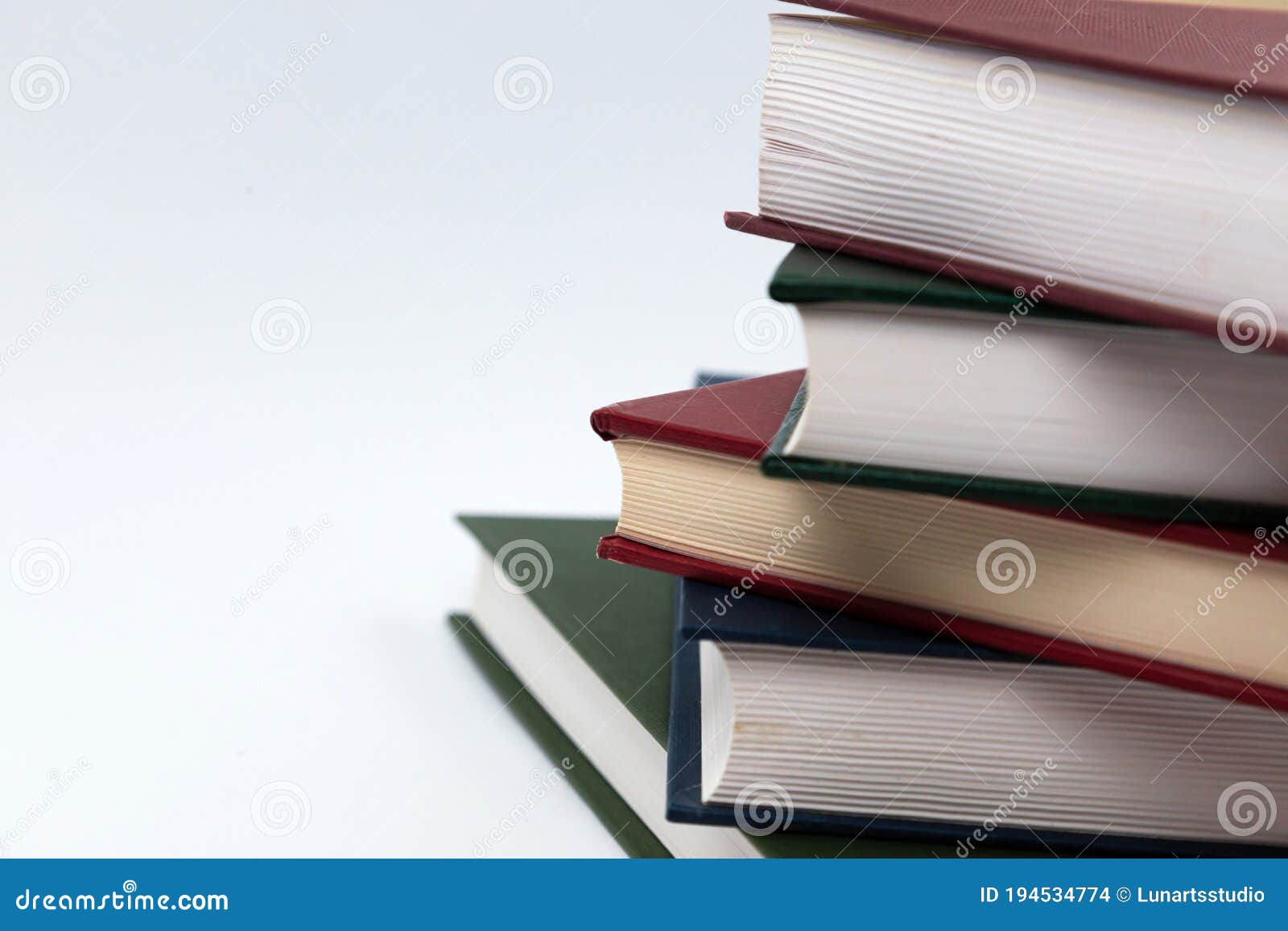 Book Stack on a White Background. Education Concept Side View Close Up ...