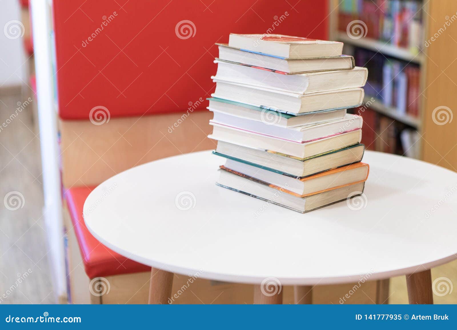 Book Stack on White Desk stock image. Image of learn - 141777935