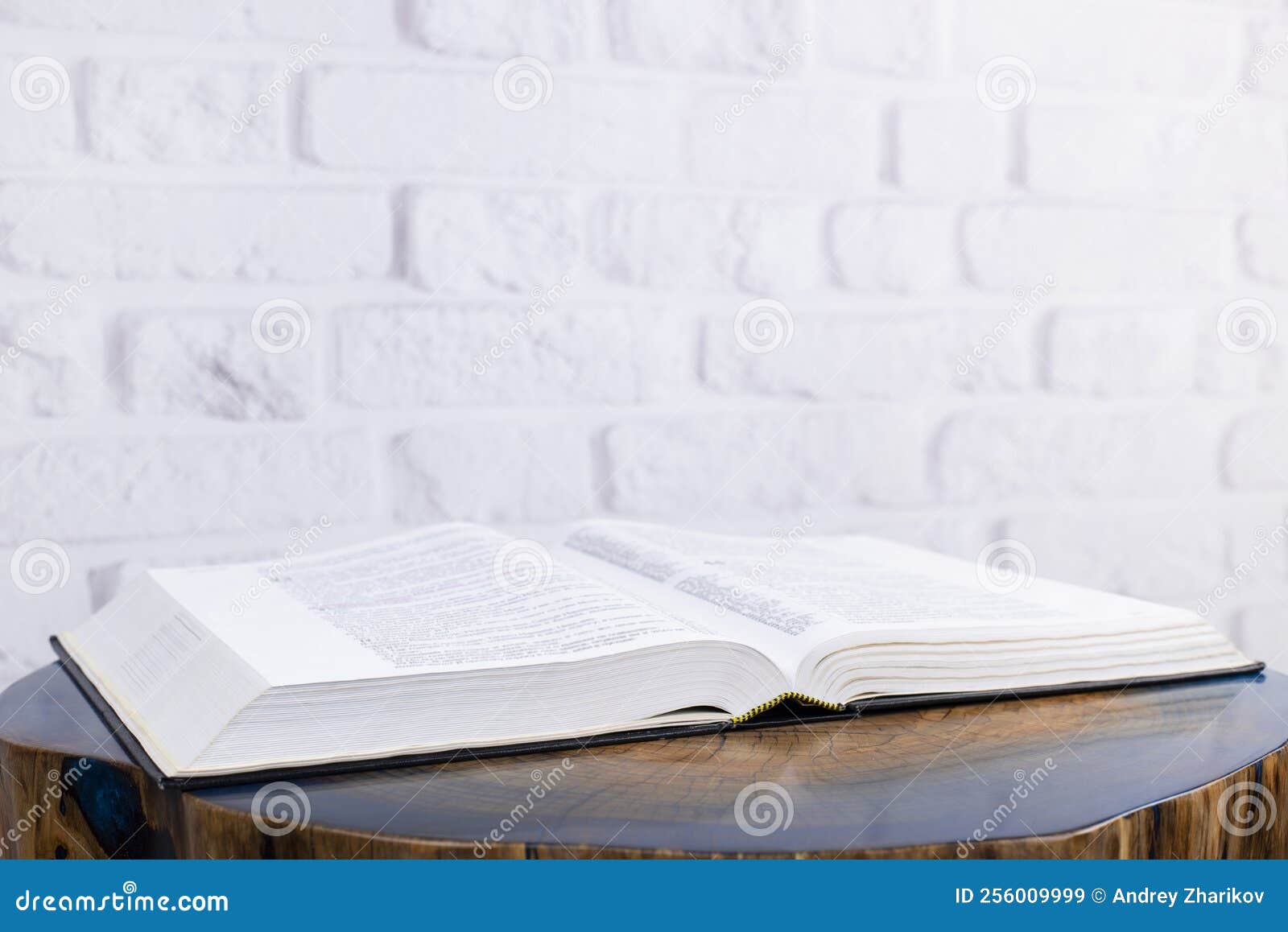 The Book is on the Table. Open Holy Bible. Decorative Wooden Table ...