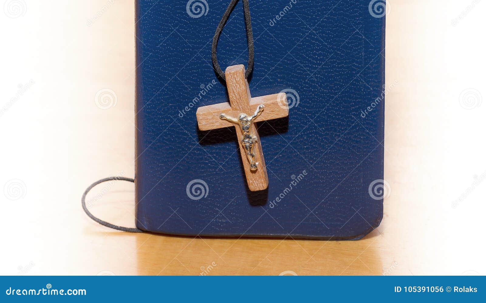 Book and a wooden cross stock photo. Image of surface - 105391056