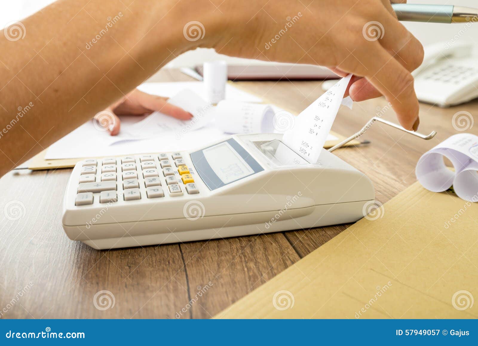 Bookkeeper Doing Calculations on an Adding Machine Stock Image - Image ...