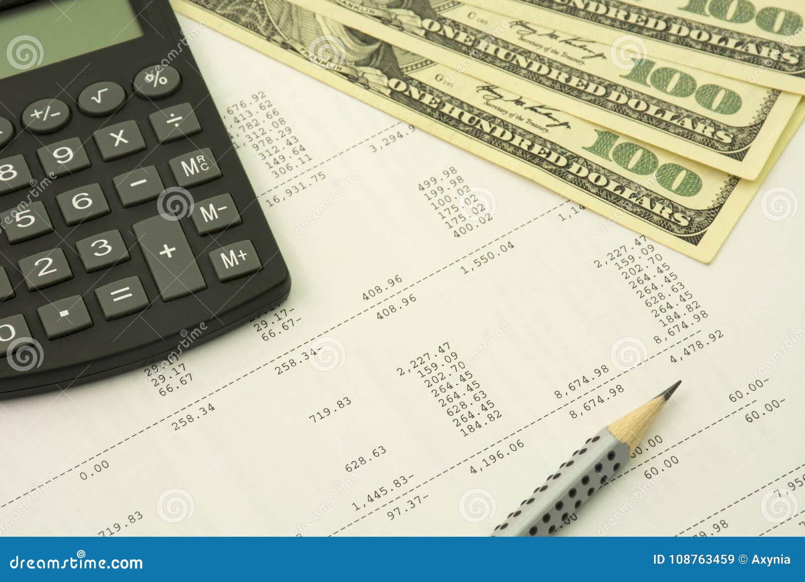 Bookkeeping Concept. Dollars, Pencil and Calculator on a Numbers ...
