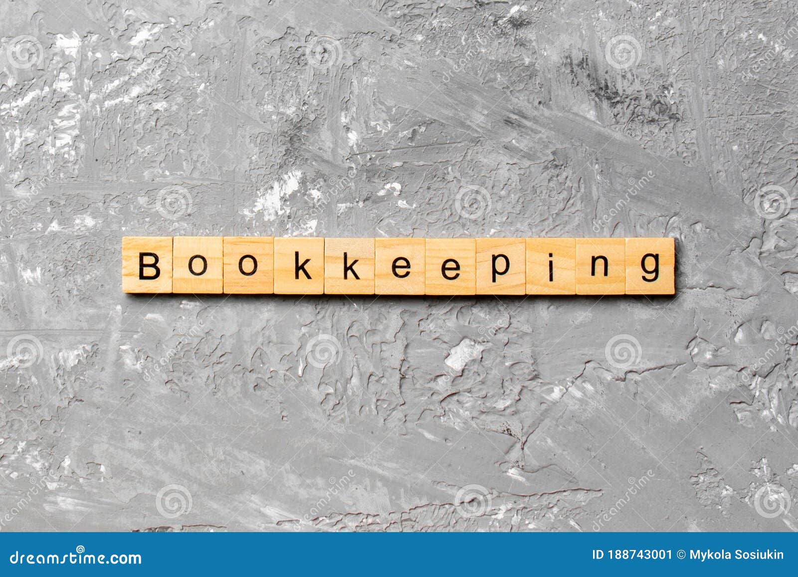 Bookkeeping Word Written on Wood Block. Bookkeeping Text on Table ...