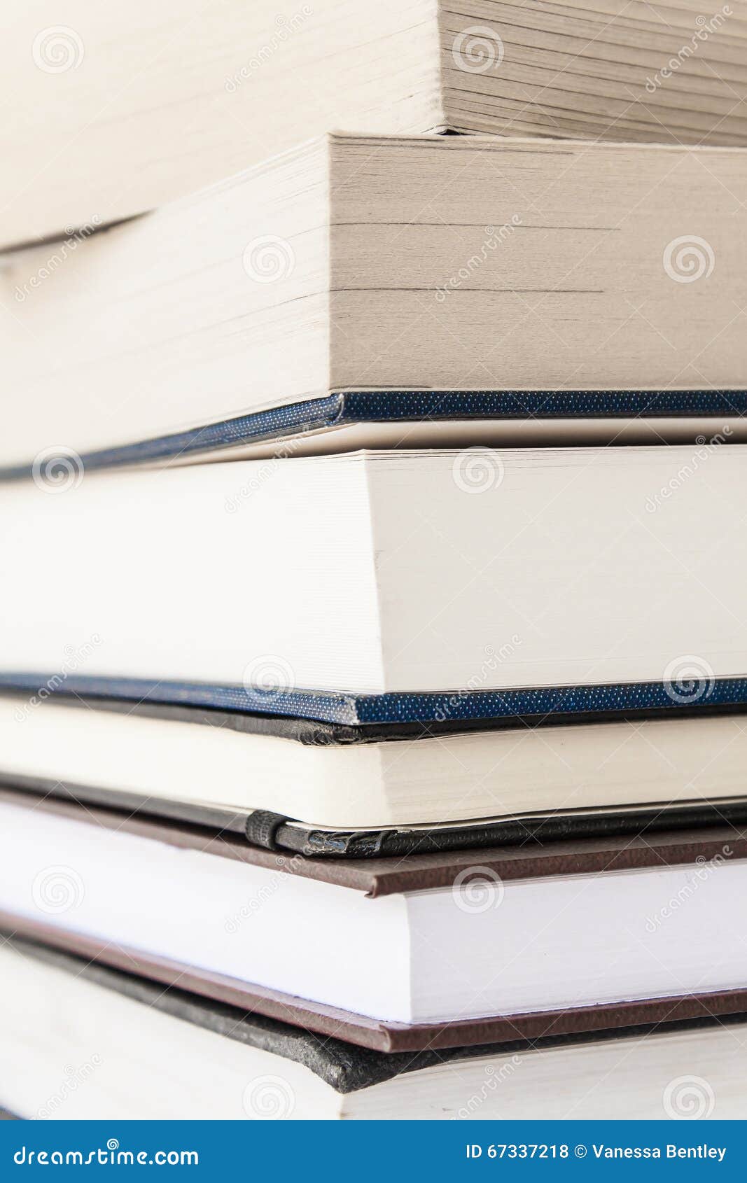 Books arranged in a pile stock photo. Image of heap, cover - 67337218