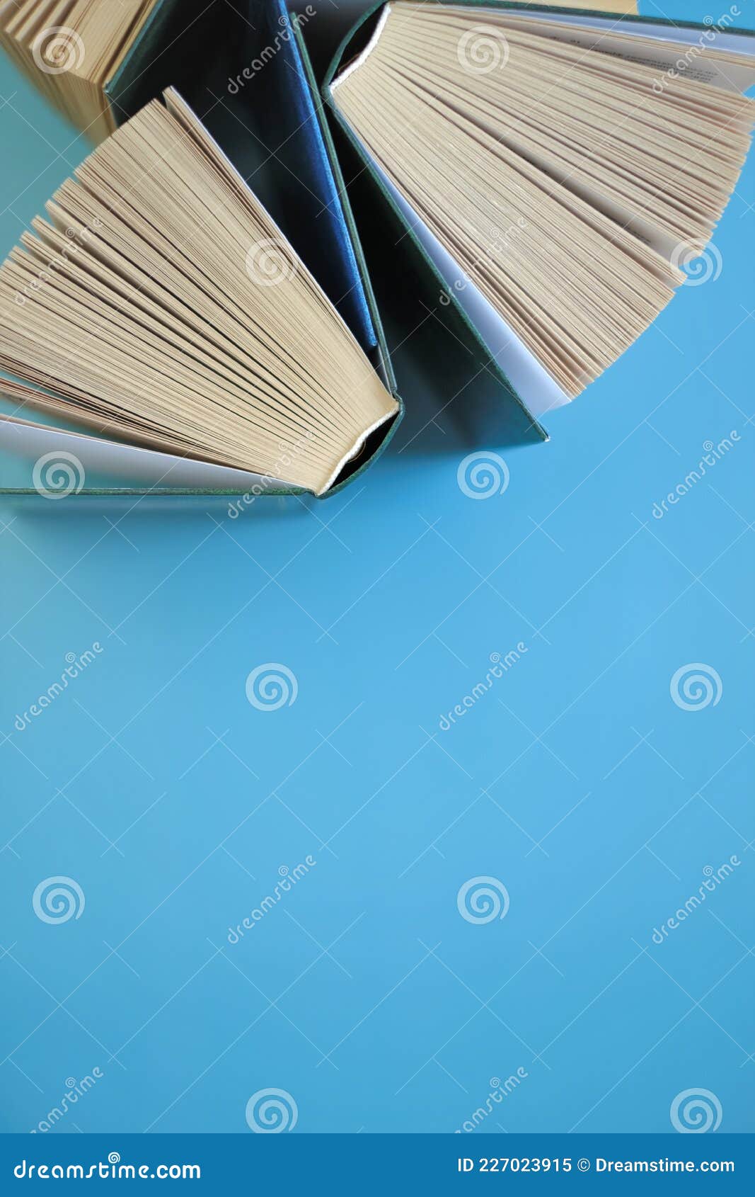 Books on a Blue Background.Reading of Books.Knowledge and Learning ...
