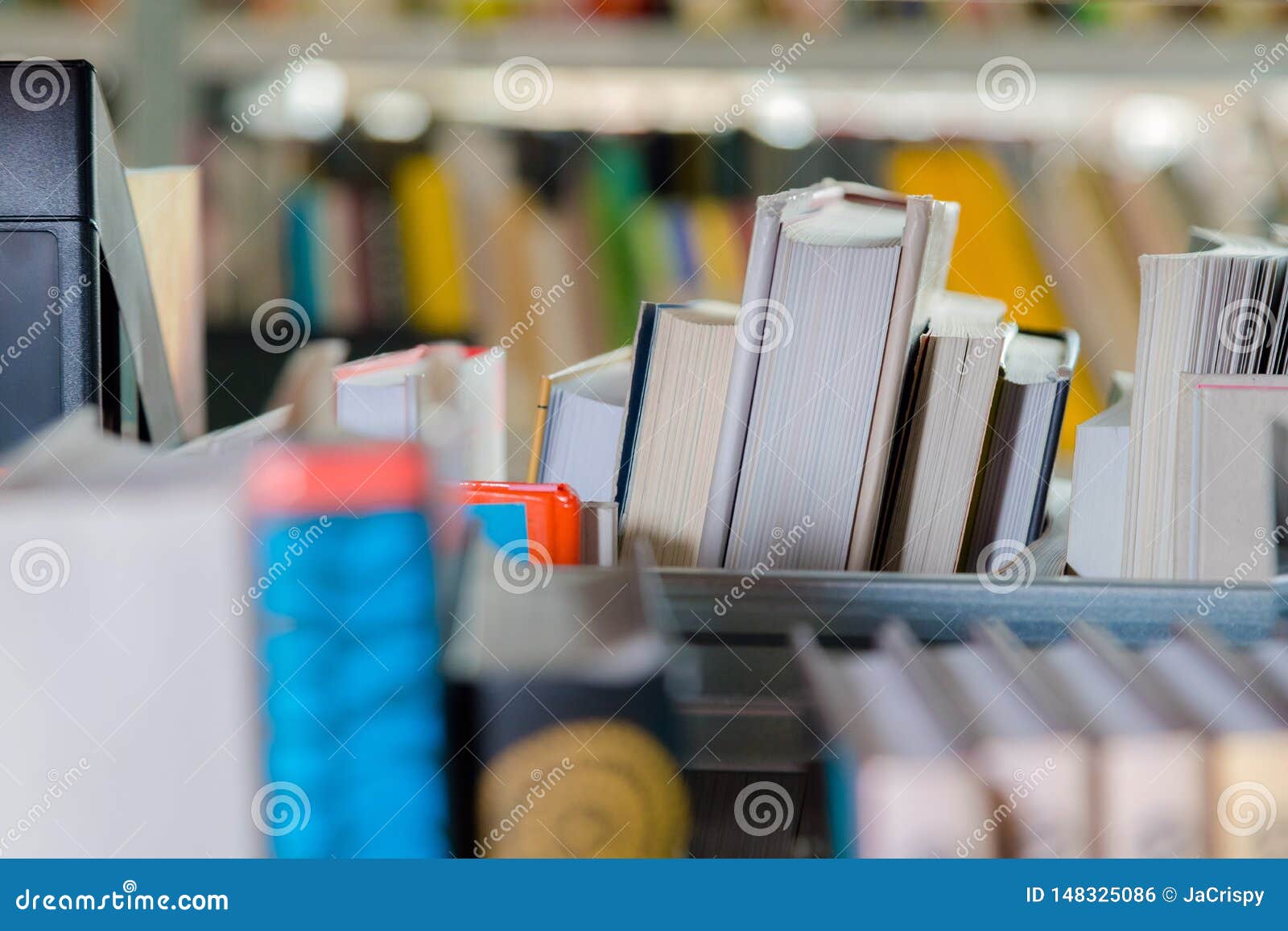 Books in a Book Shelf in the Library. Selection of Literature ...