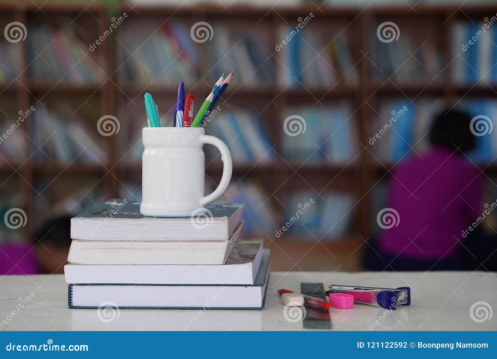 Books on the Desk in the School Library. Stock Photo - Image of ...