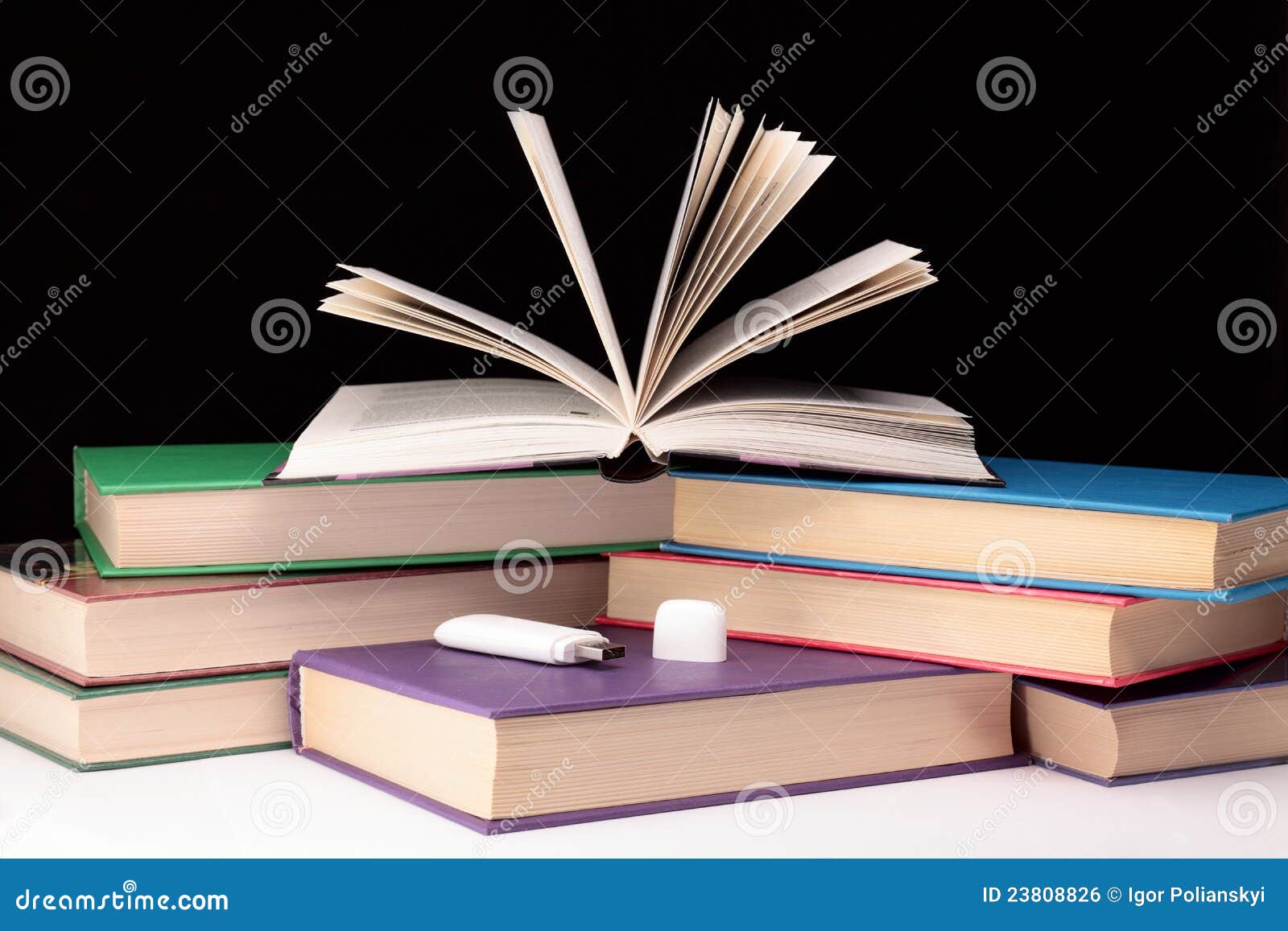 Books and flash drive. stock photo. Image of equipment - 23808826
