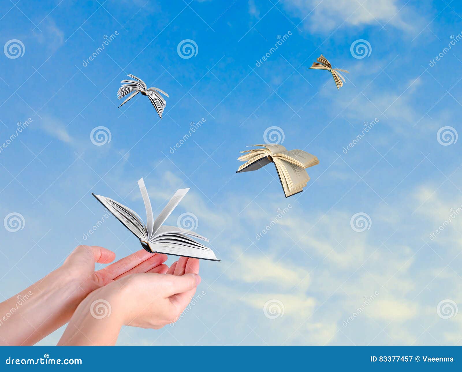 Books flying from hands stock image. Image of library - 83377457