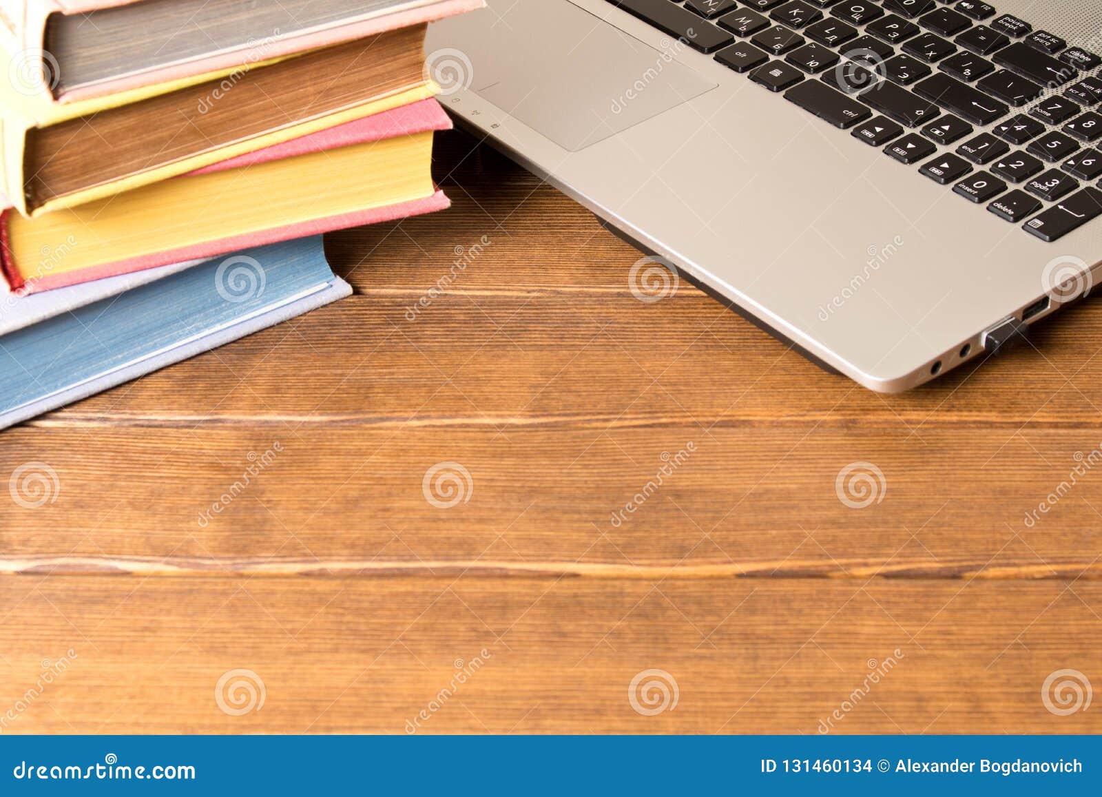 Books and Laptop on Wooden Table. the Concept of Learning from Books or ...