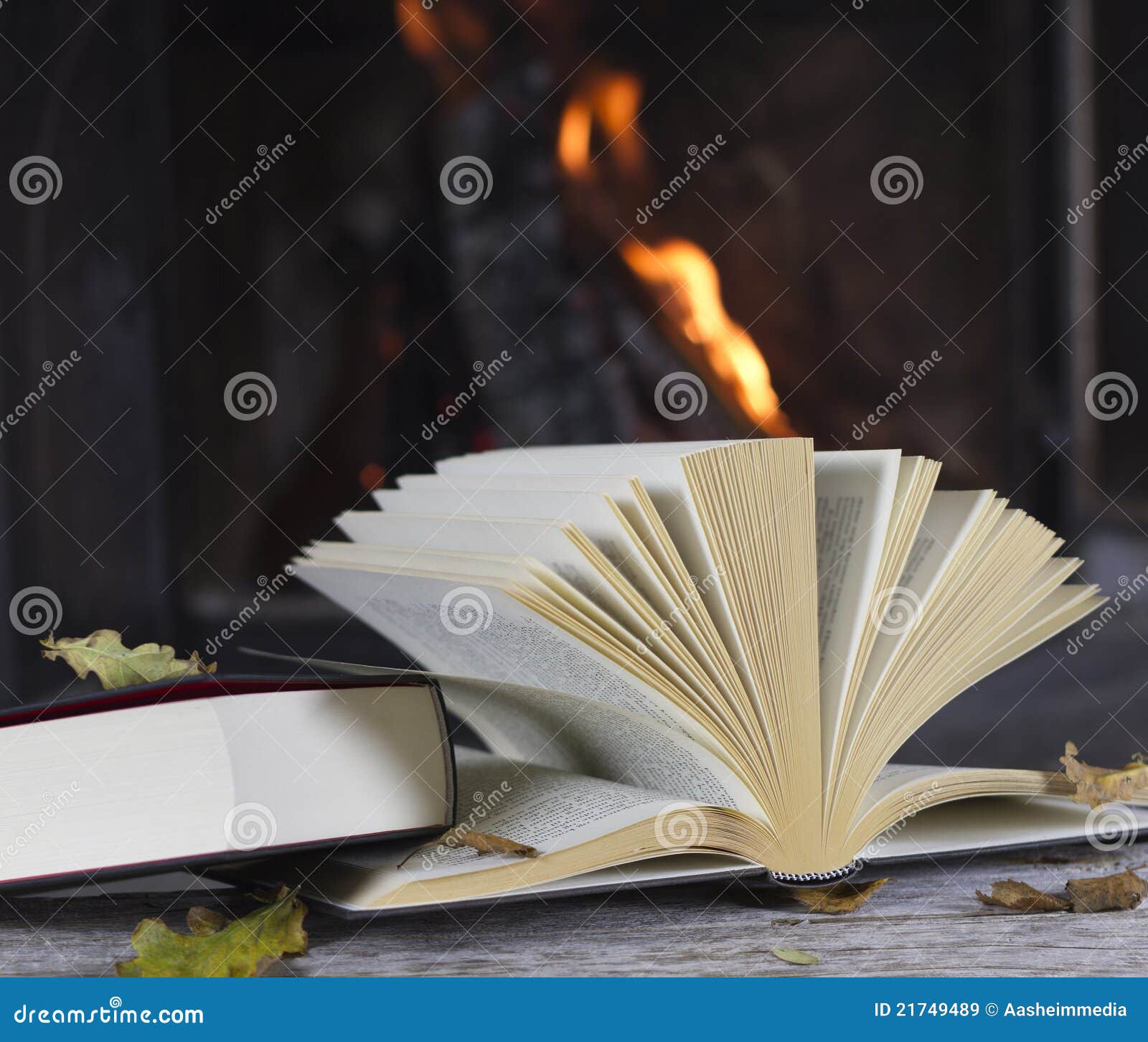 Books Lying on a Table in Front of a Fireplace Stock Image - Image of ...