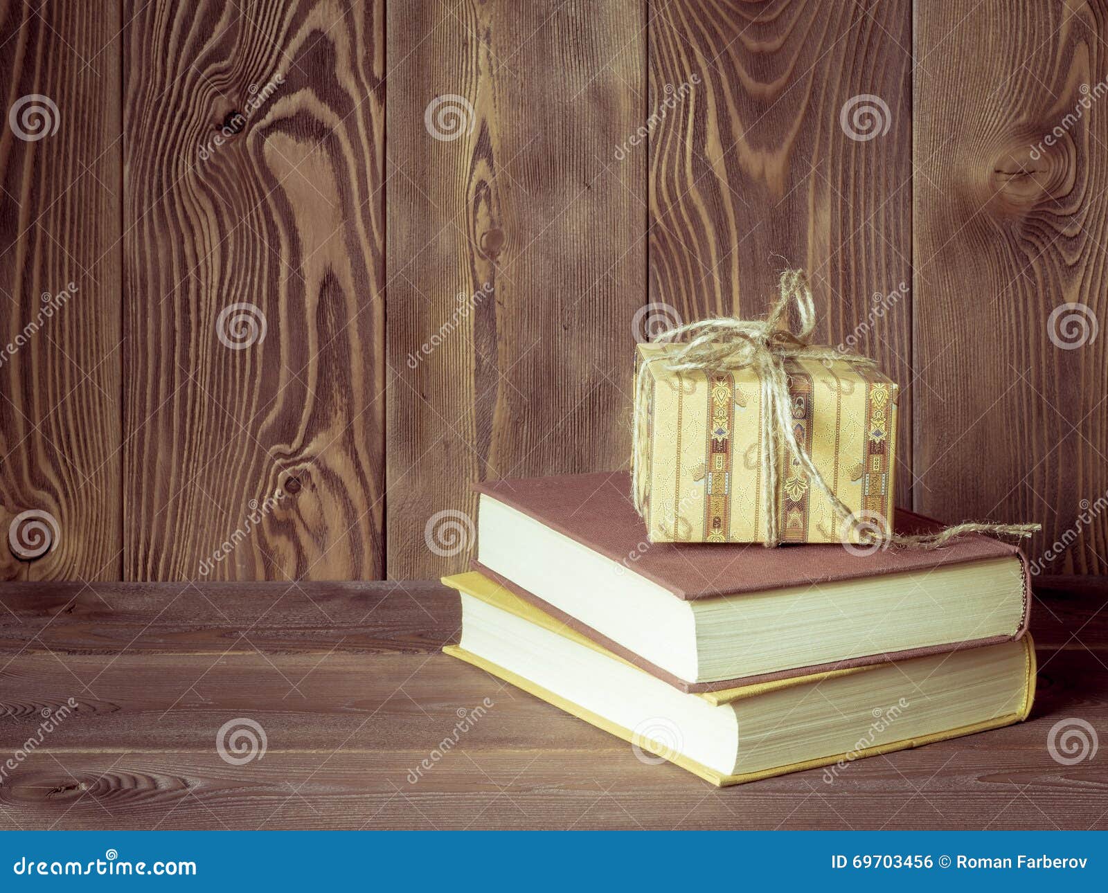 Books lying on the table stock photo. Image of table - 69703456