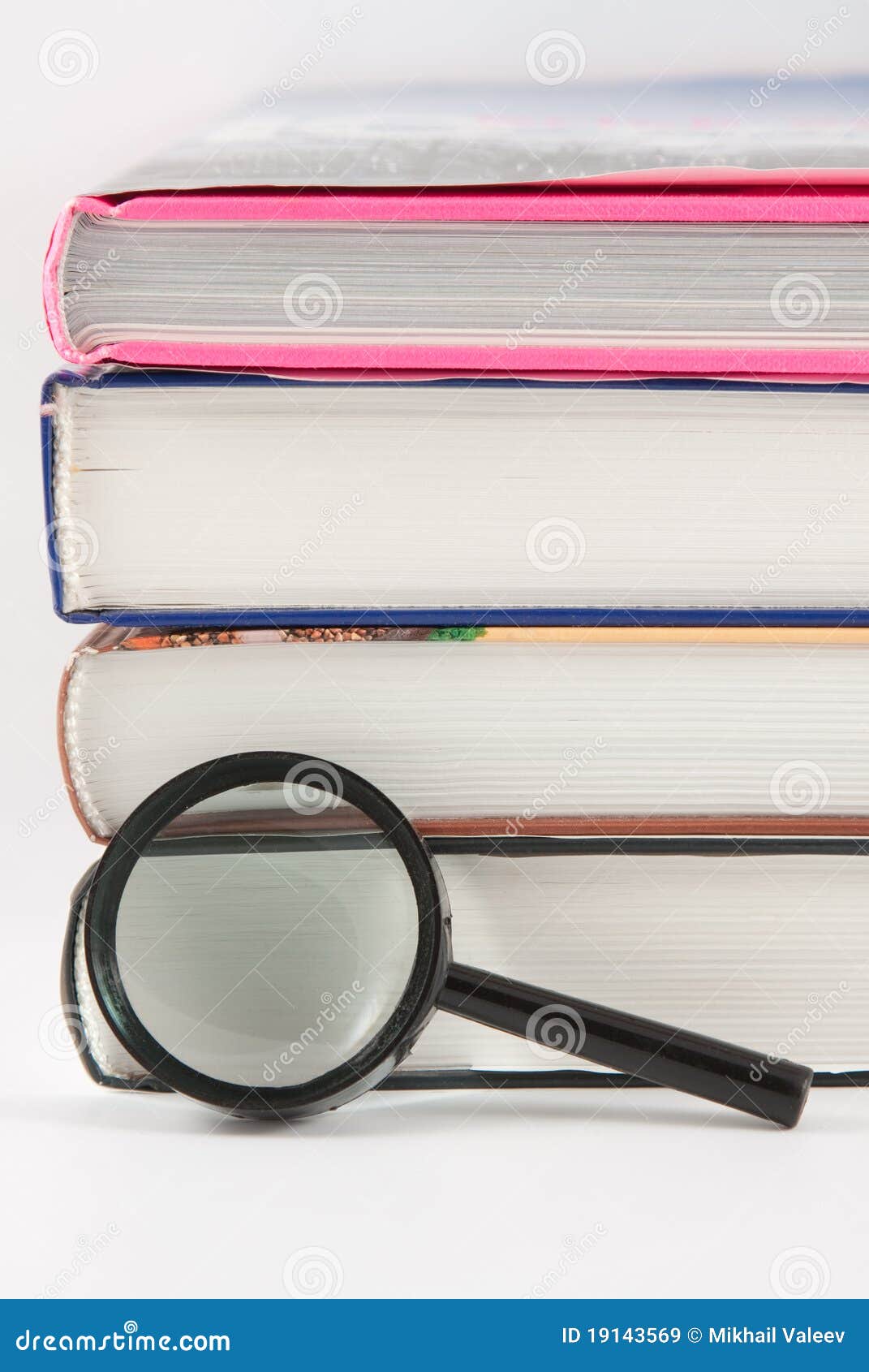 Books and magnifying lens stock image. Image of glass - 19143569