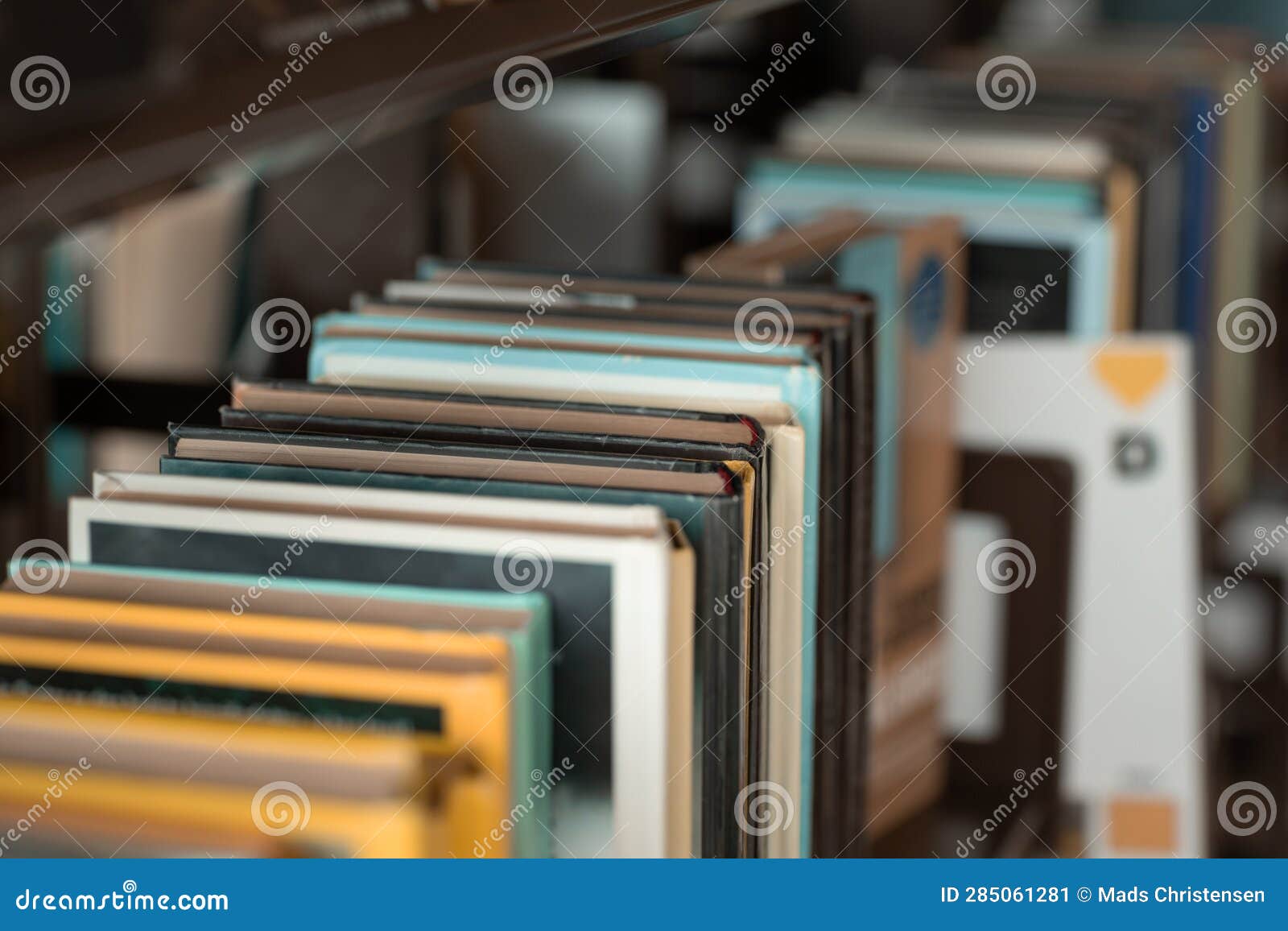 Books in Muted Colors on Standing Packed on Shelf in Public Library ...