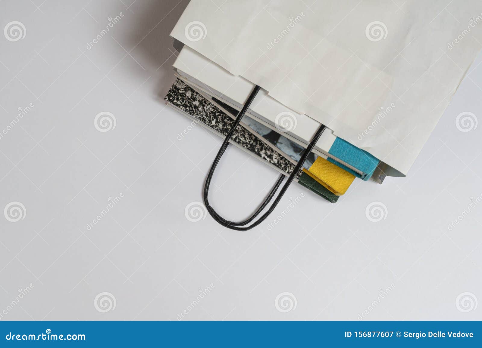 Books in a paper pag stock image. Image of inside, market - 156877607