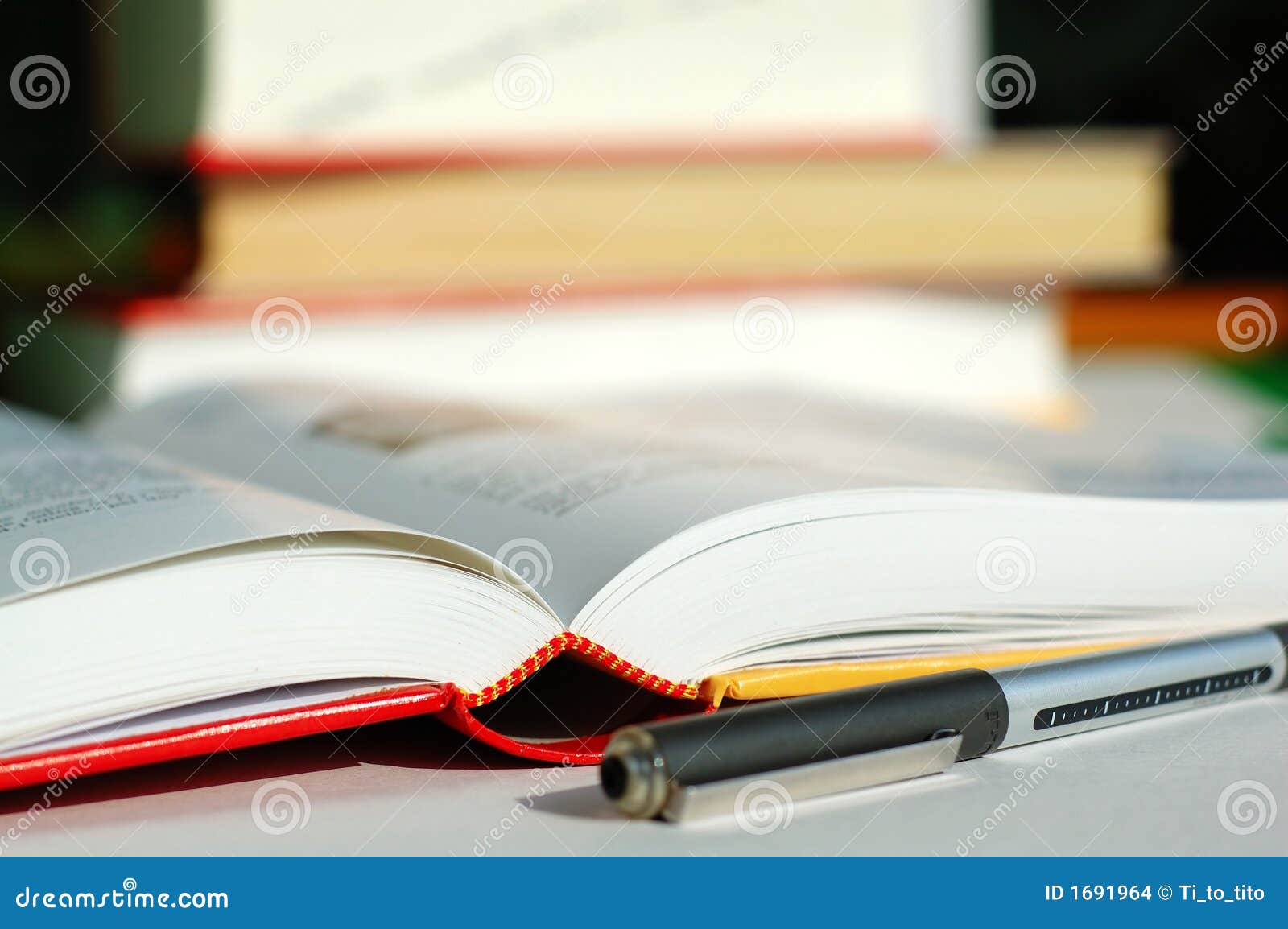 Books and pen stock photo. Image of papers, bookstacks - 1691964