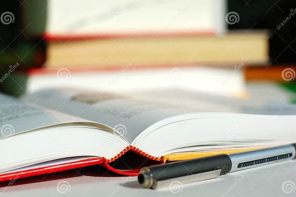 Books and pen stock photo. Image of papers, bookstacks - 1691964