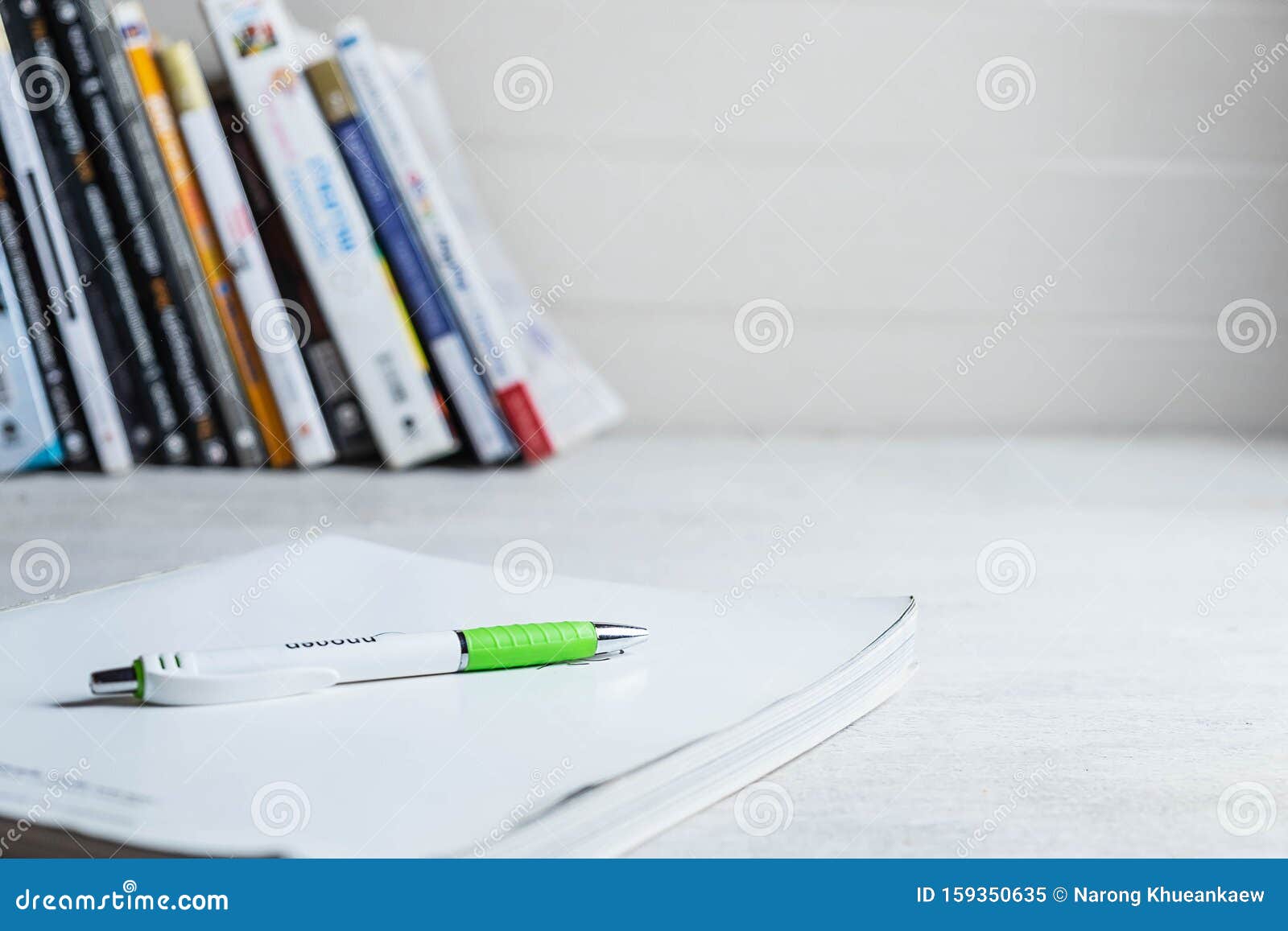 Books and Pens.of Students on the White Table Stock Image - Image of ...