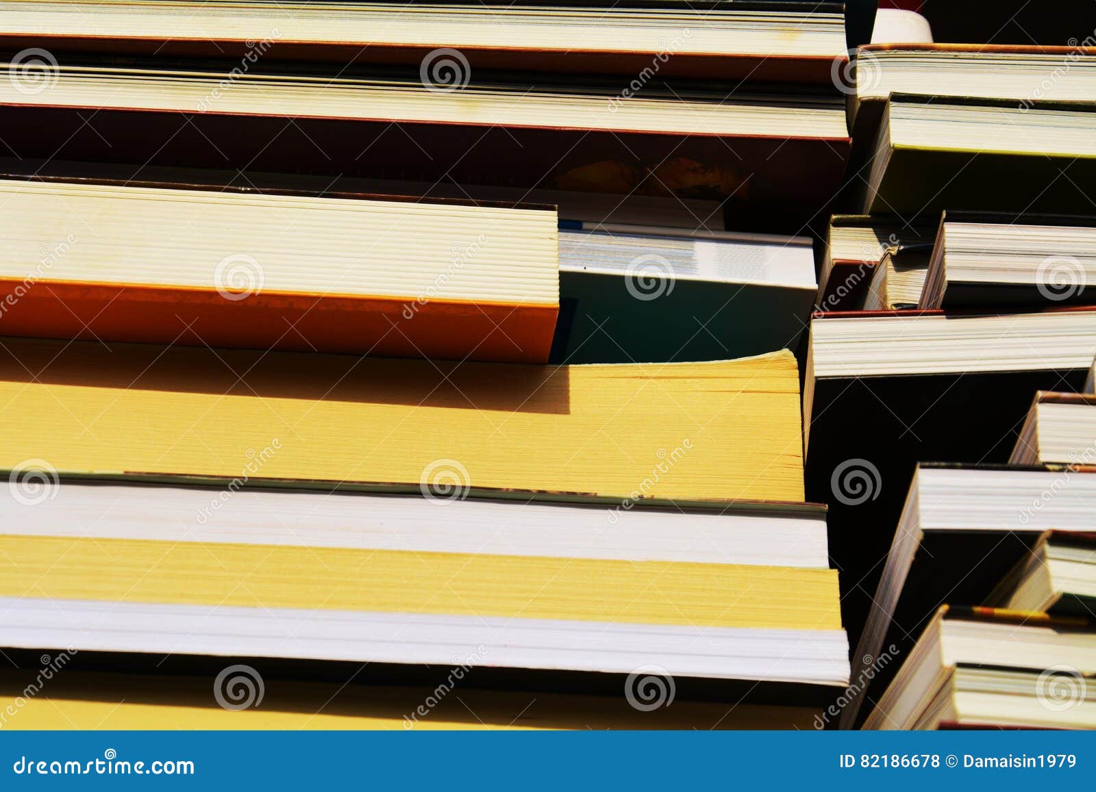 Books on a Shelf in Disorder Stock Photo - Image of study, information ...